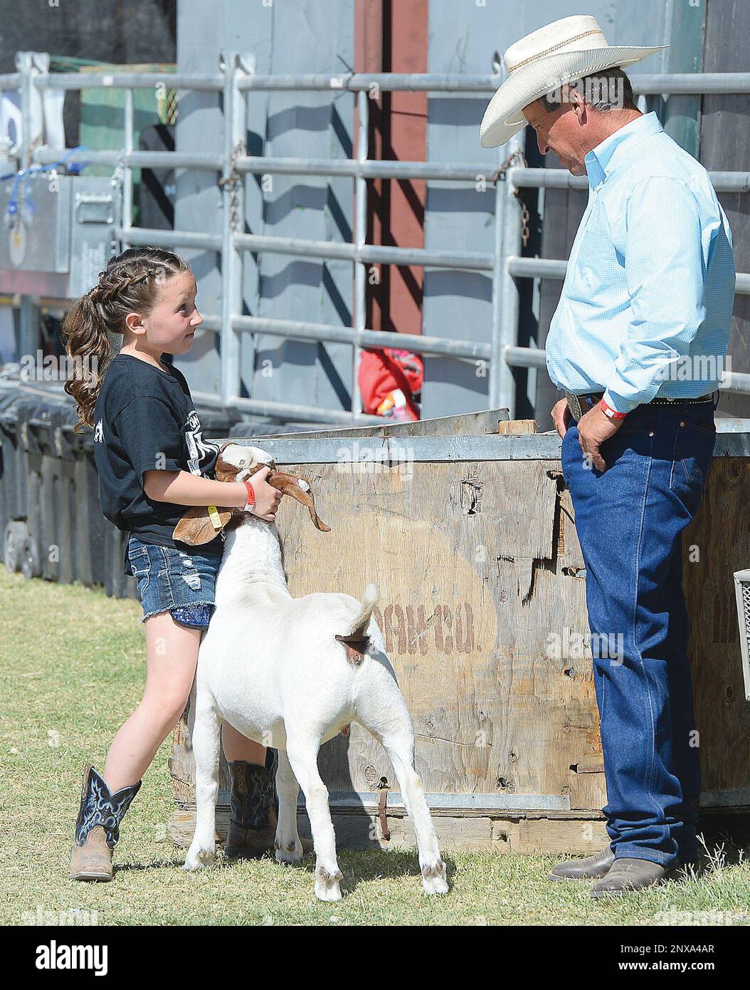 Nine-year-old Gwenneth Bernal, left, practices her showmanship skills ...