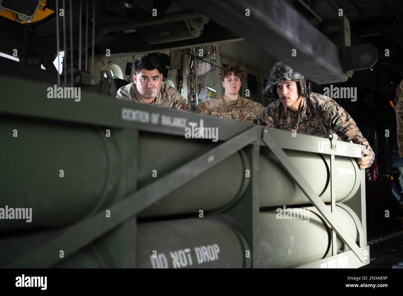 A Marine assigned to the 3rd Marine Expeditionary Force ensures the ...