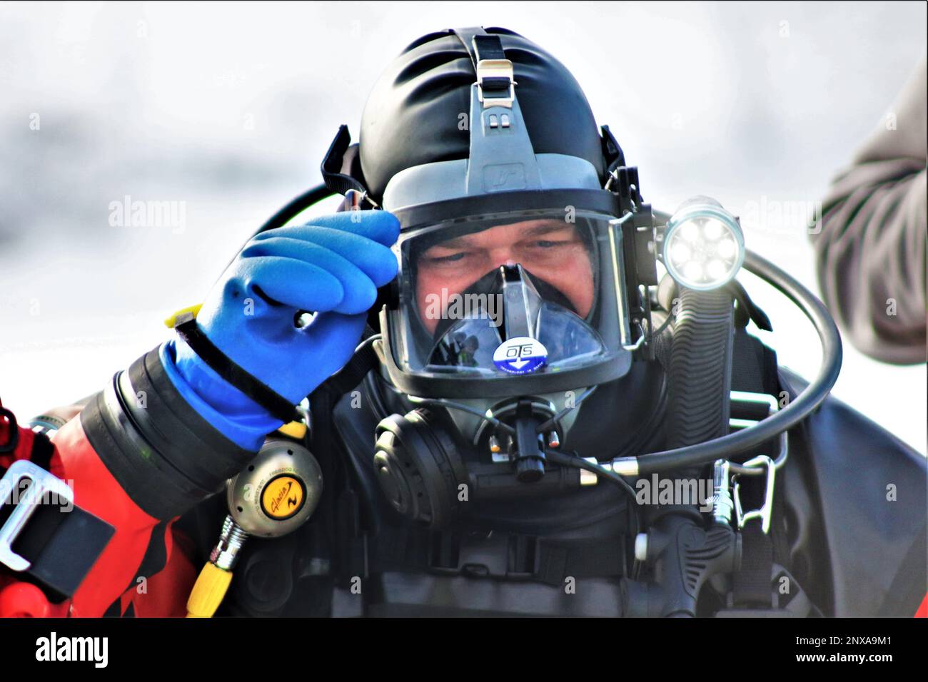 A firefighter with the Directorate of Emergency Services Fire ...