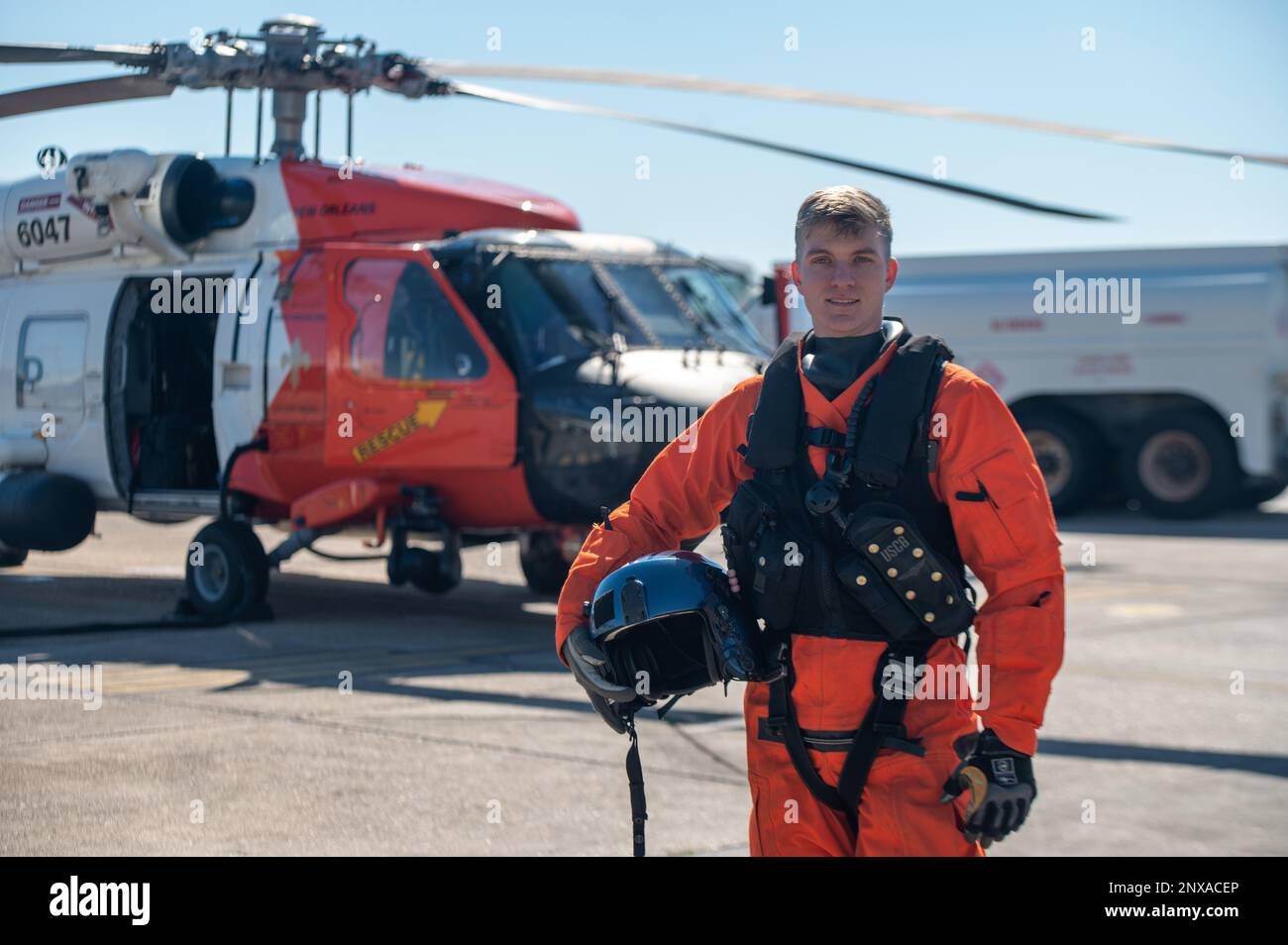 Petty Officer 2nd Class Hunter Simpson, an Mh-60 flight mechanic ...
