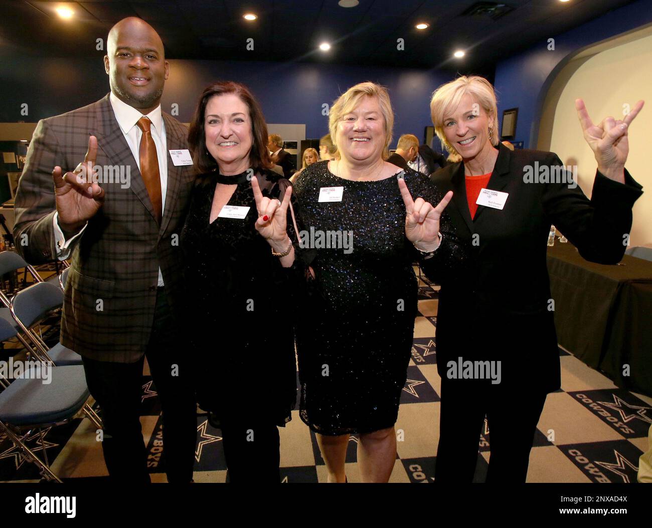 Former Texas Longhorns, from left, Vince Young, Cathy Self-Morgan, Jill ...
