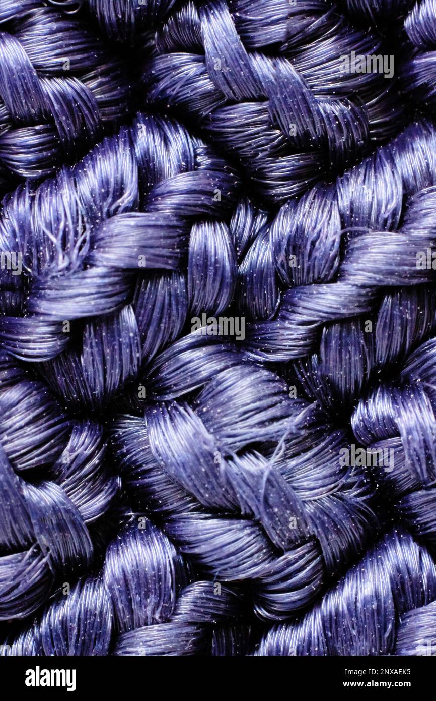 Loops on a knitted blue fabric, background or texture Stock Photo - Alamy