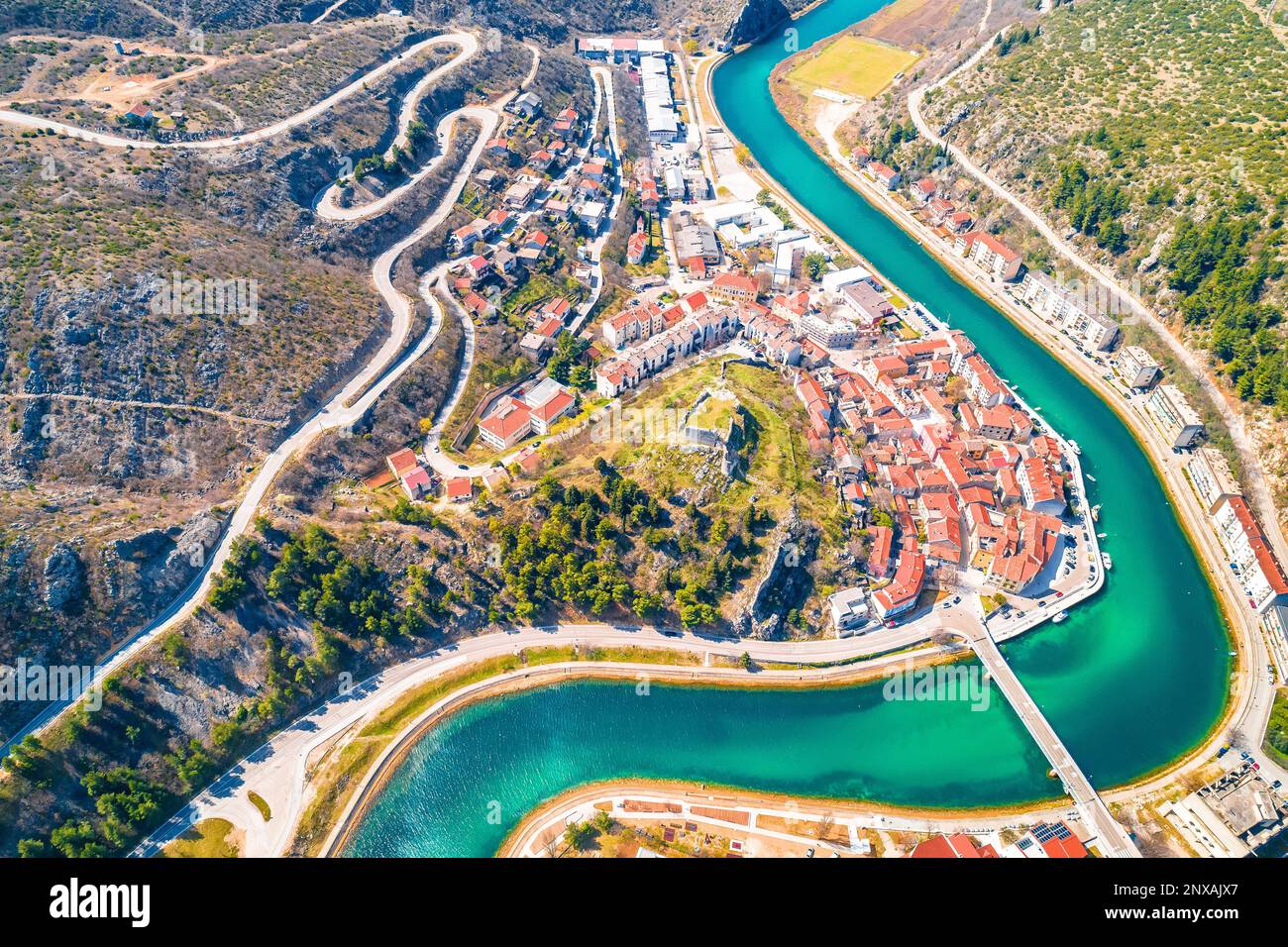 Town of Obrovac and Zrmanja river aerial view, Dalmatia archipelago of ...