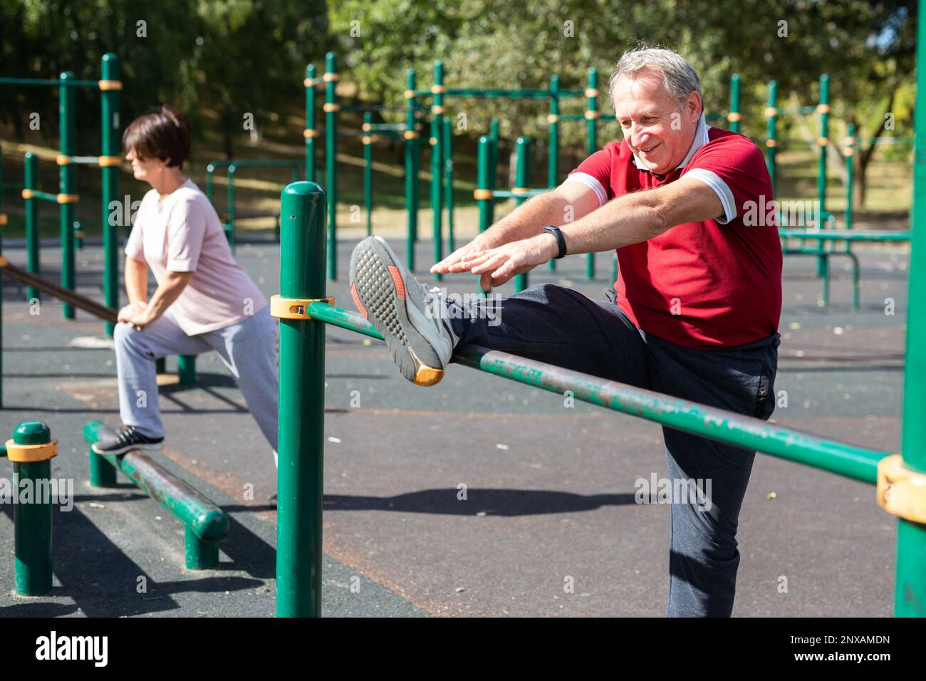 Old european man stretching hi-res stock photography and images - Alamy