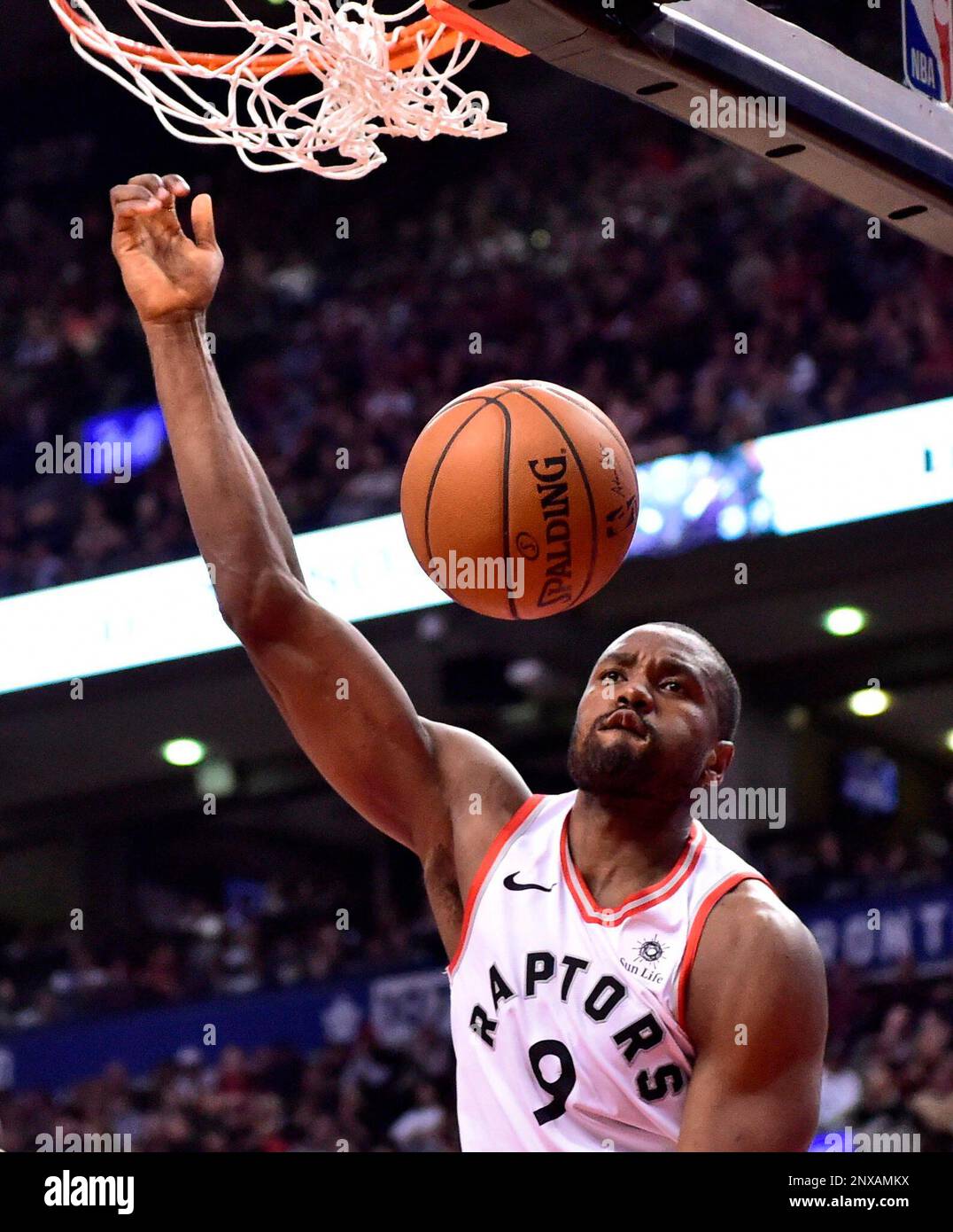 Toronto Raptors forward Serge Ibaka dunks against the Boston Celtics ...