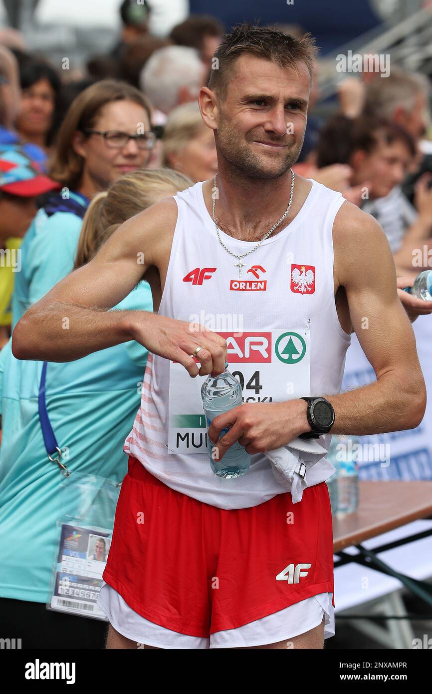 Adamat NOWICKI getting water after the Marathon at the European ...