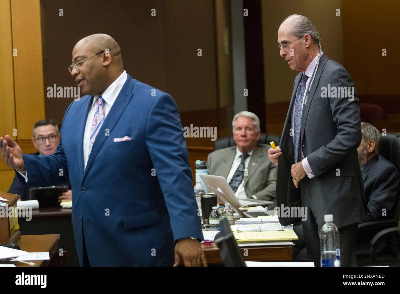 Defense attorney Bruce Harvey (R) objects to a question asked by Fulton ...