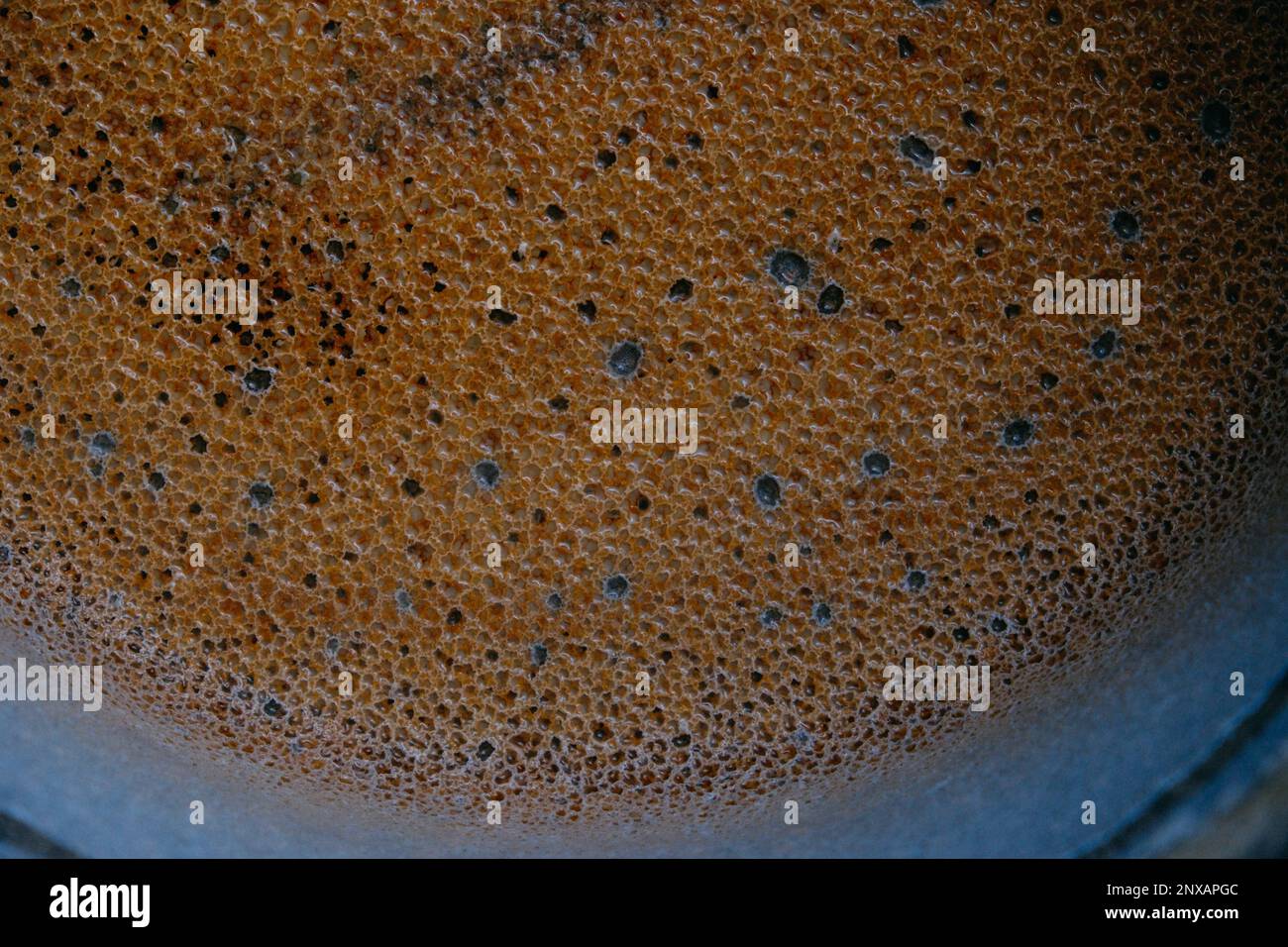 Empty burnt pot on wooden table background, burnt milk, unclean able ...