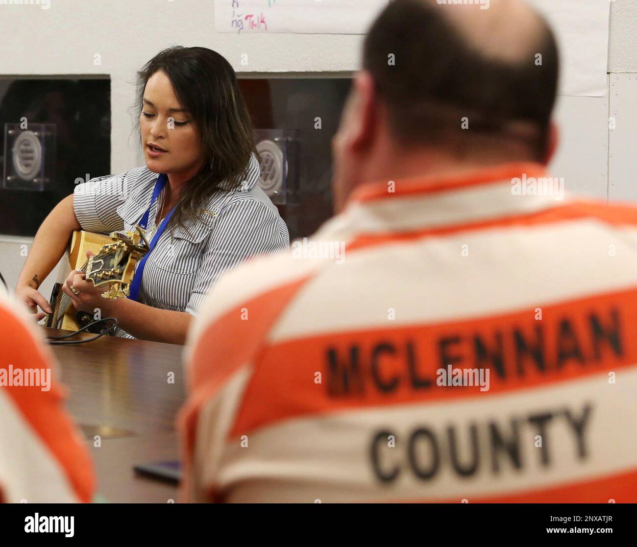 In this March 21, 2018, photo local musician Kayla Ray plays a song for ...
