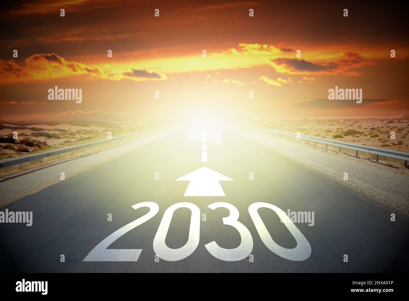 2030 - empty road on a desert and sunset sky Stock Photo - Alamy
