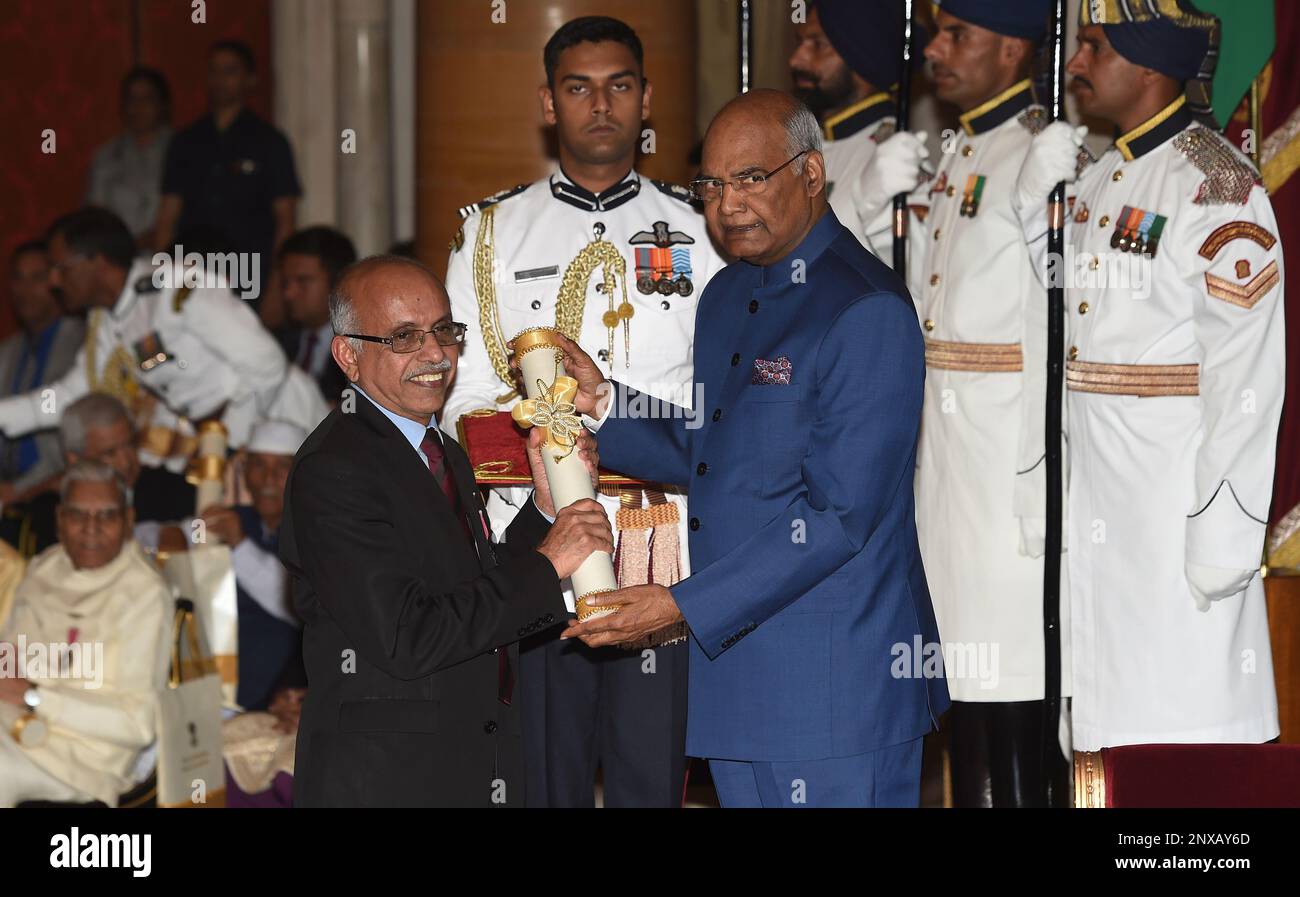 Indian President Ram Nath Kovind, right, awards the Padma Shri award to ...