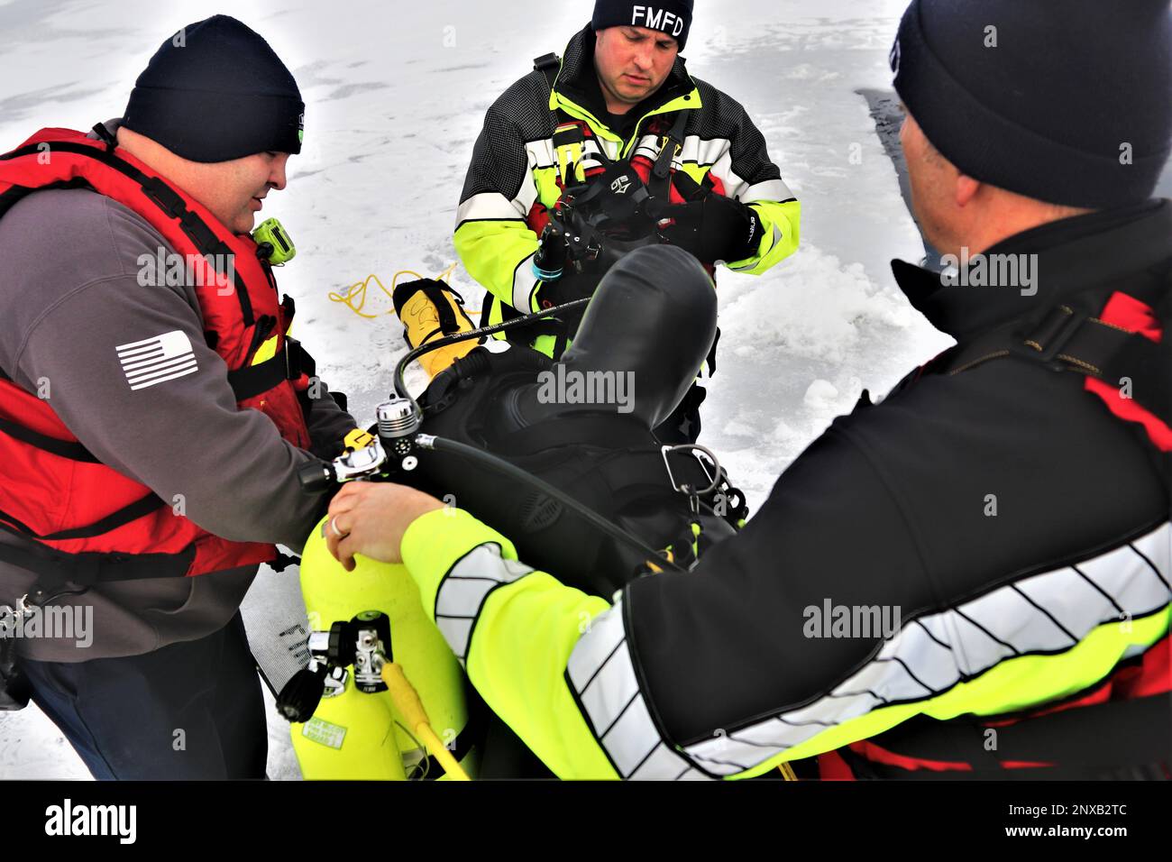 Firefighters with the Directorate of Emergency Services Fire Department ...