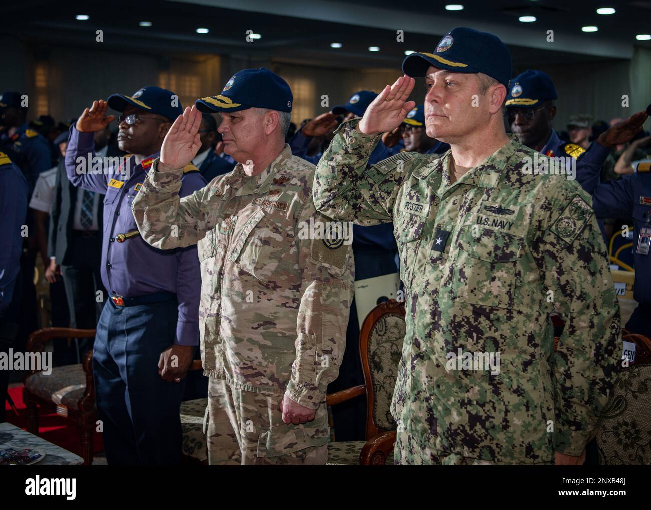 230203-N-DK722-1001 (Feb. 3, 2023) LAGOS, Nigeria – From right, U.S ...