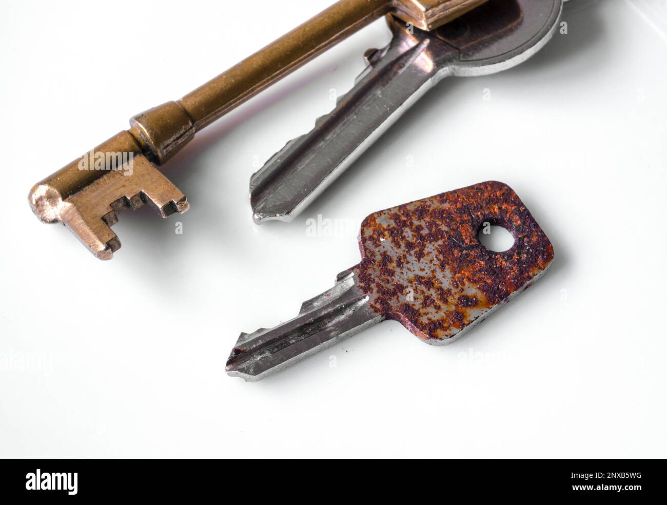 Small corroded key on white background 2 Stock Photo - Alamy