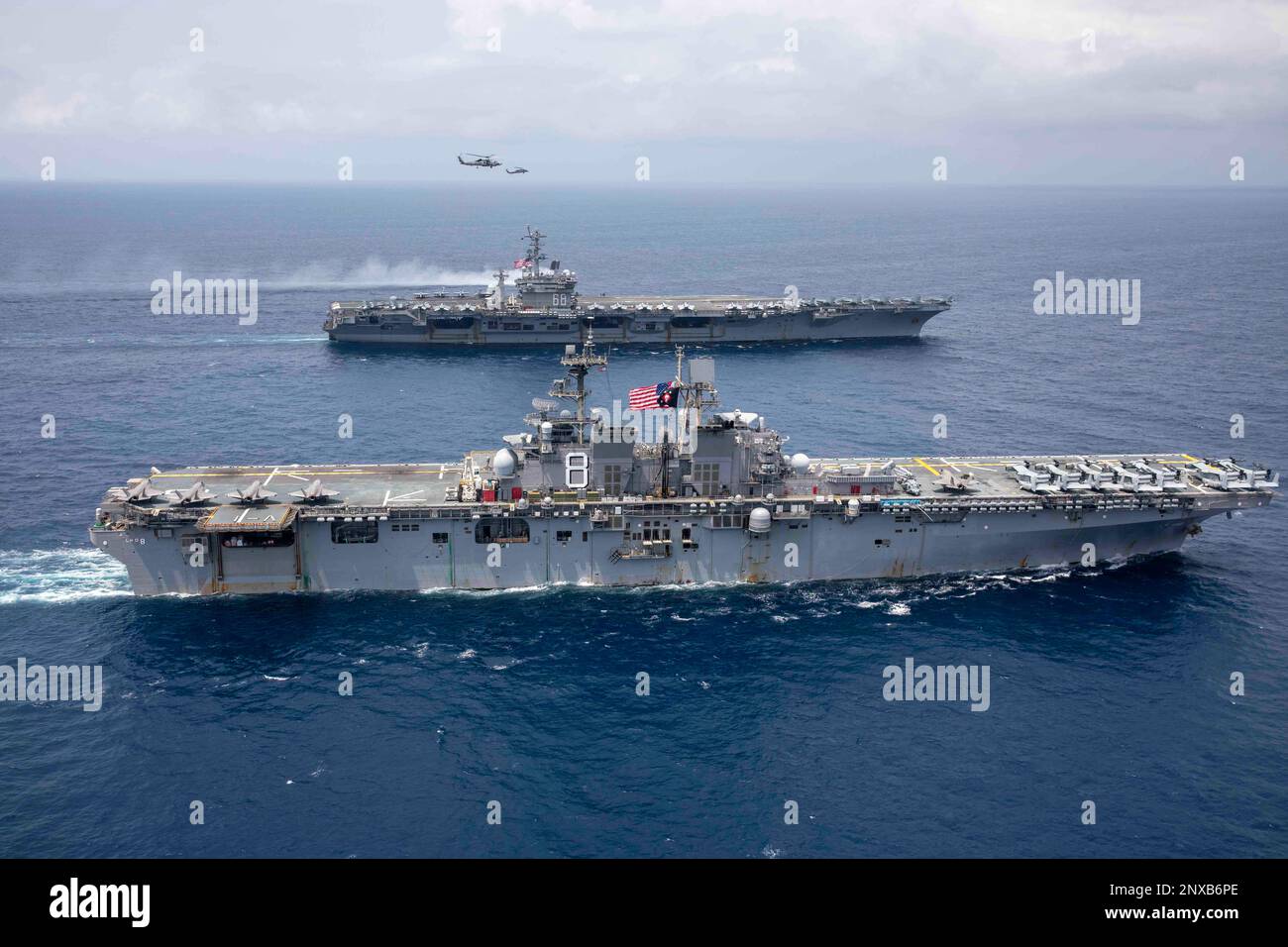 Amphibious assault ship USS Makin Island (LHD 8) and aircraft carrier ...