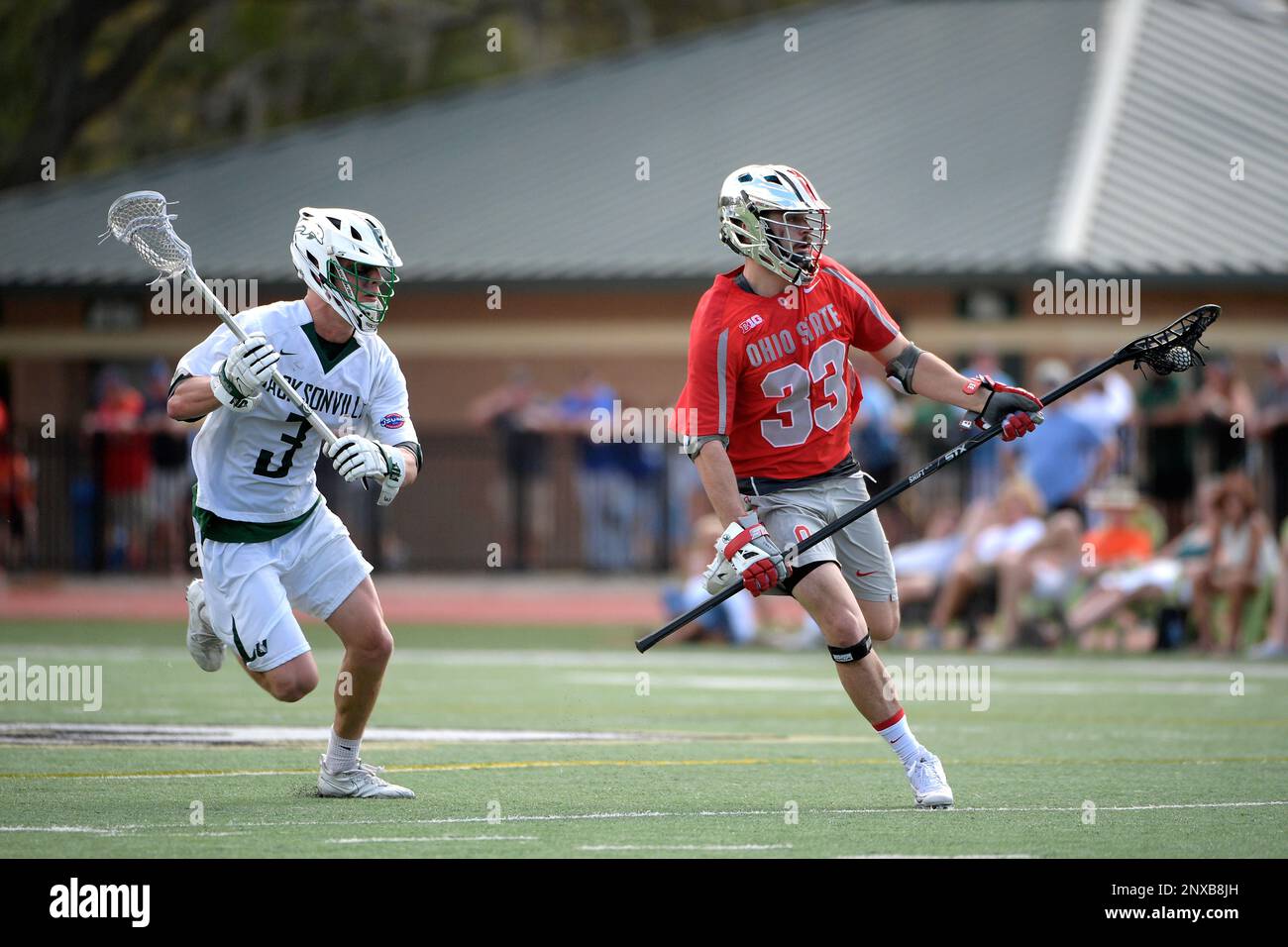 Ohio State's Jeff Henrick (33) controls the ball in front of ...