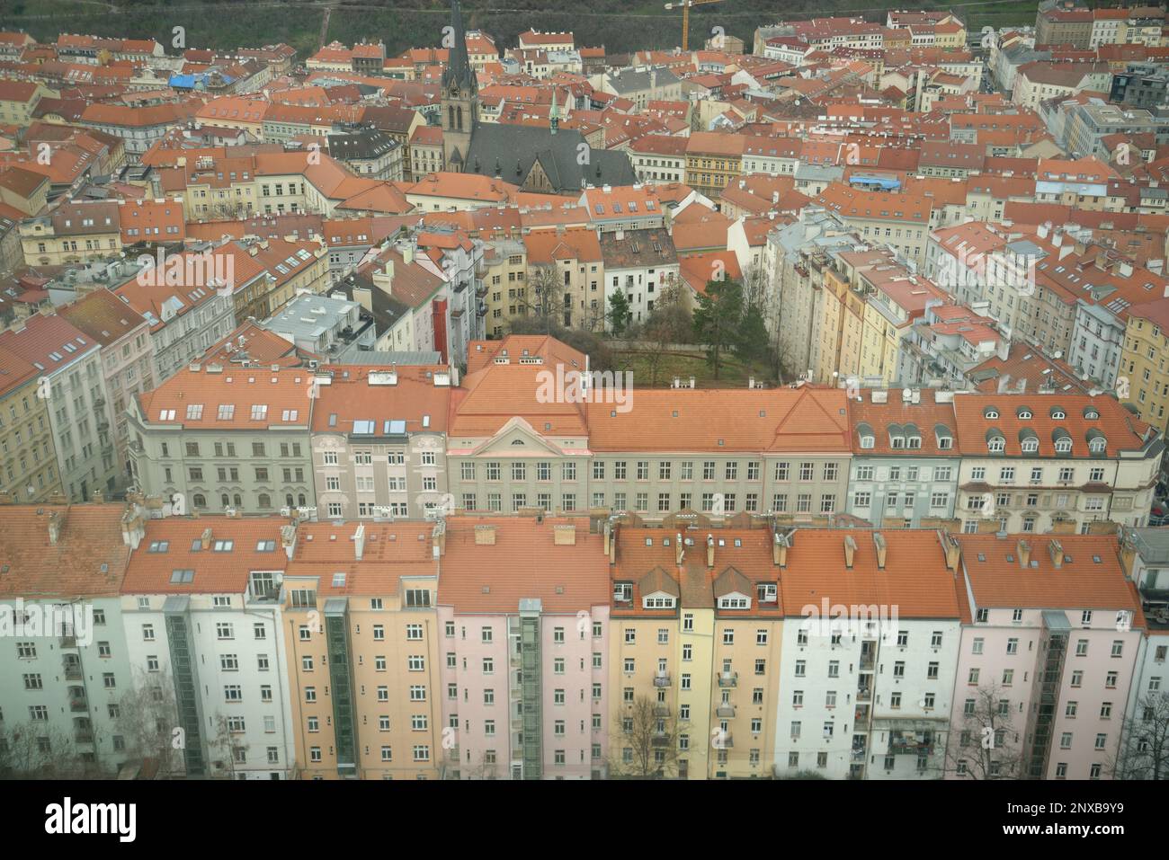 View of houses below from The Žižkov Television Tower in Prague. Blocks ...