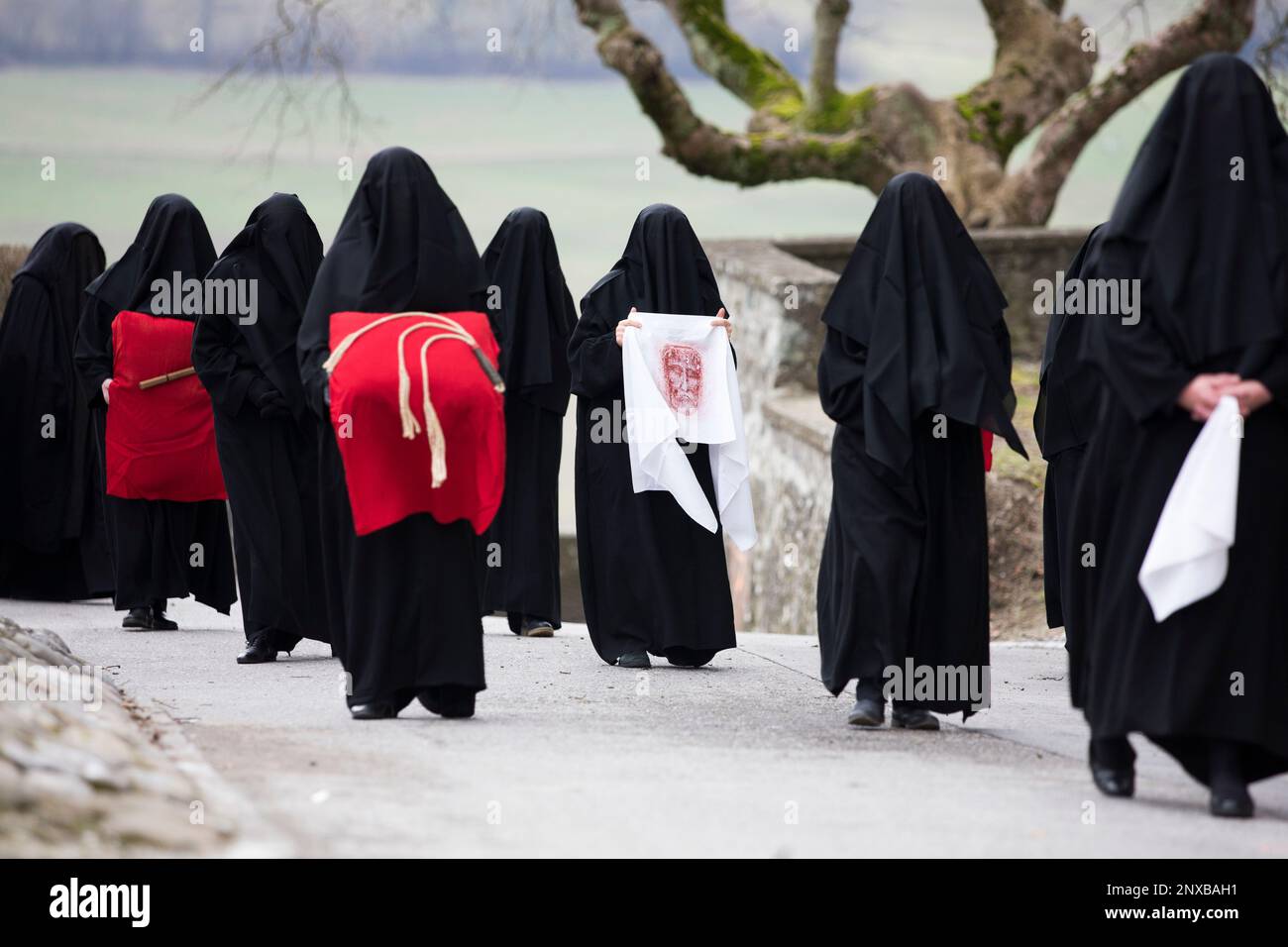 Veiled women known as "les Pleureuses" or mourning women, whose heads ...