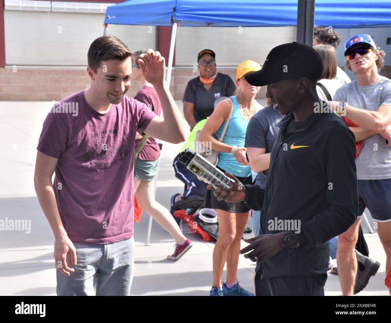 Capt. Sam Chelanga (left), a marathon runner for the Army World Class ...