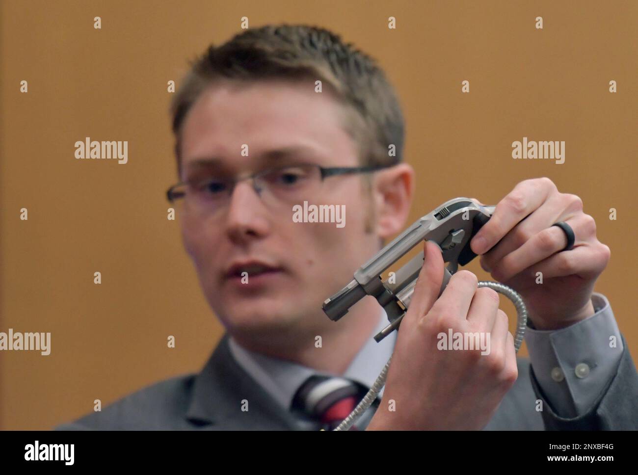 Zachary Weitzel, a GBI firearms examiner responsible for the forensic ...