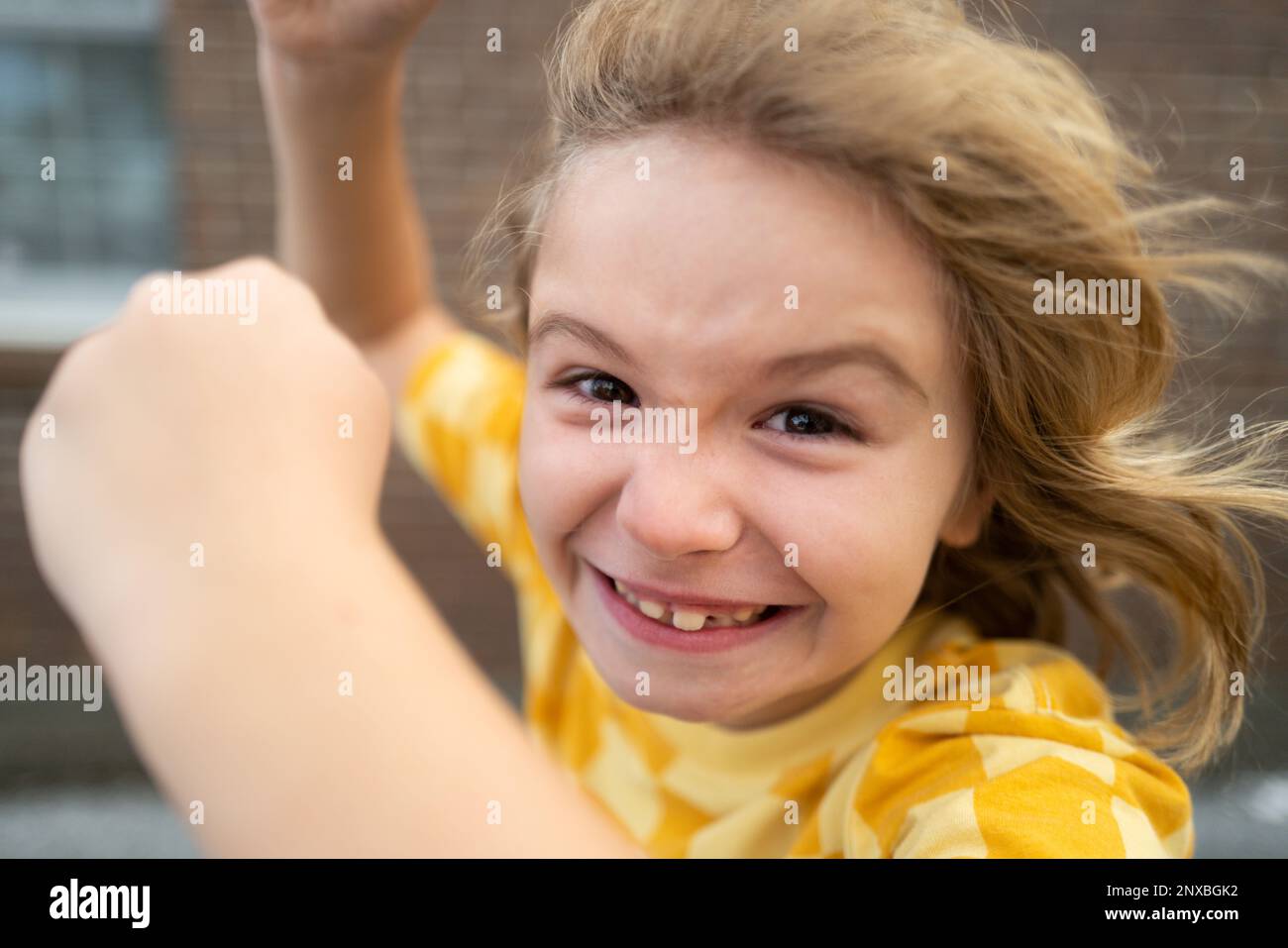 Close up mad face of kid with angry expression. Angry hateful little ...