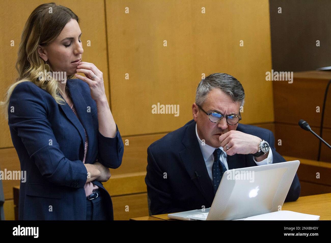 Defense attorney Amanda Clark Palmer (L) goes over the witness Dean ...