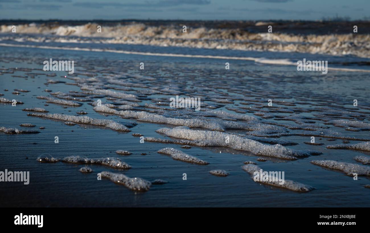 Foam on sand hi-res stock photography and images - Alamy