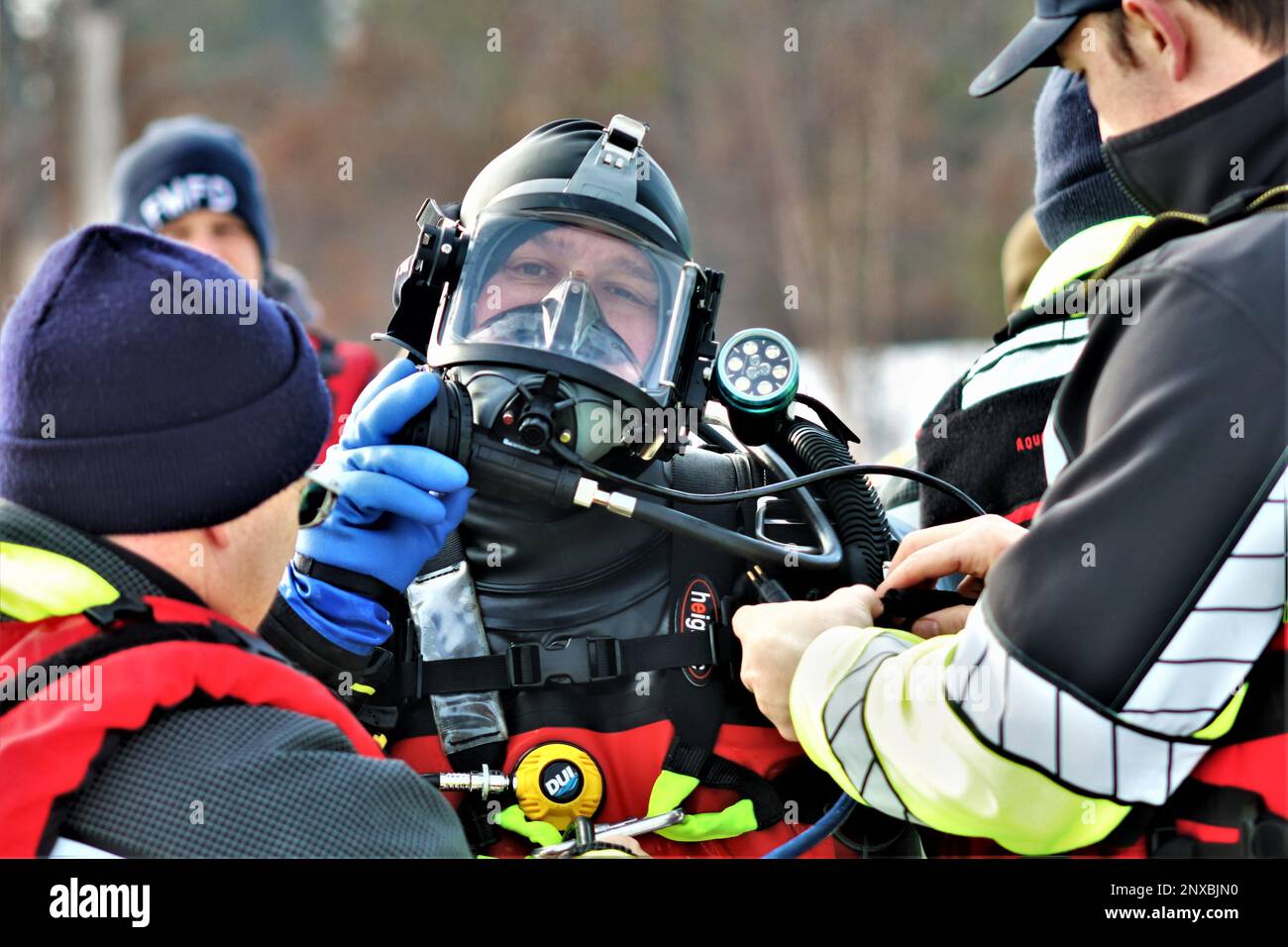 Firefighters with the Directorate of Emergency Services Fire Department ...