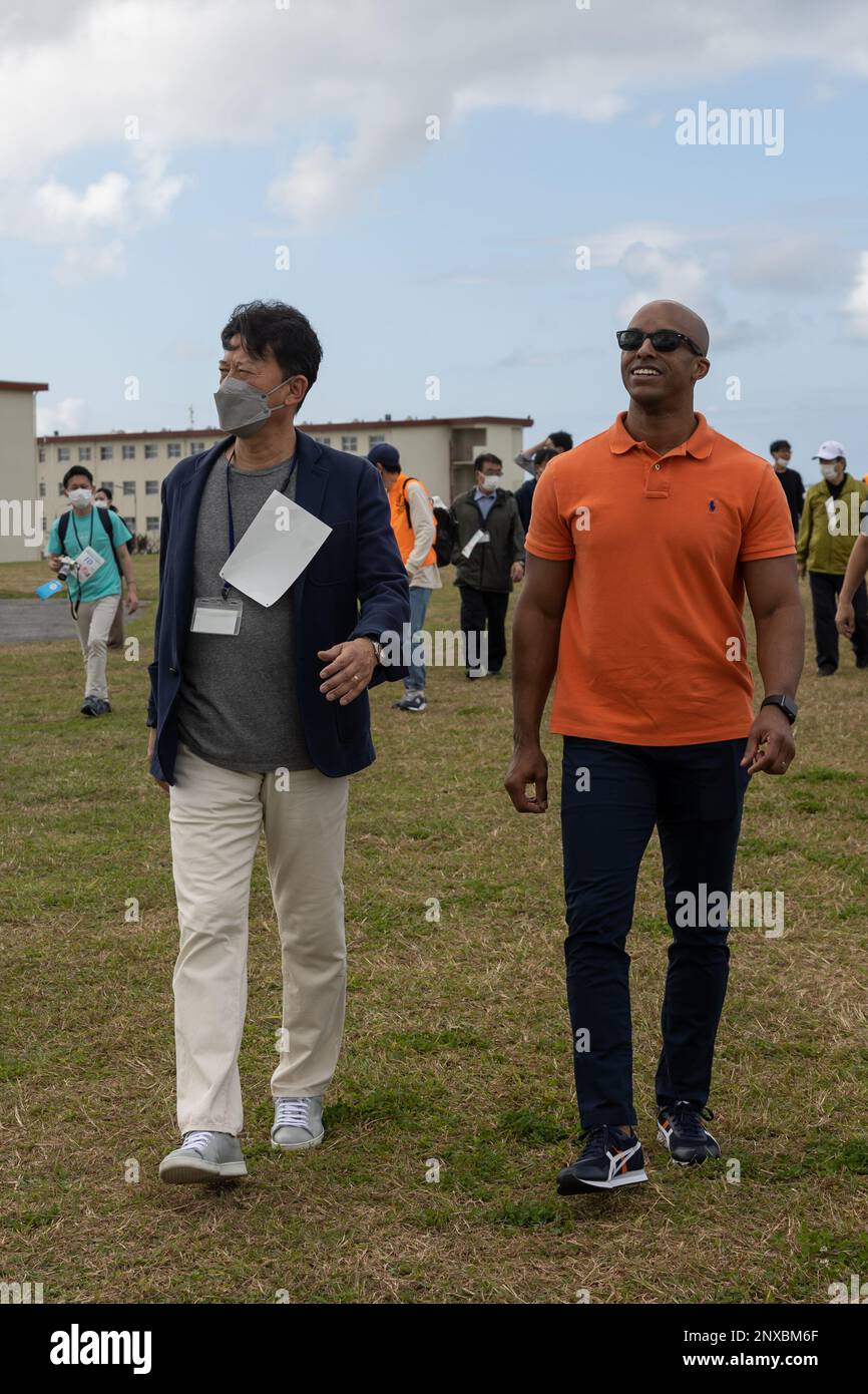 U.S. Marine Corps Col. Andre Ingram, right, Camp Kinser camp commander, and Hisaaki Suzuki, left ...