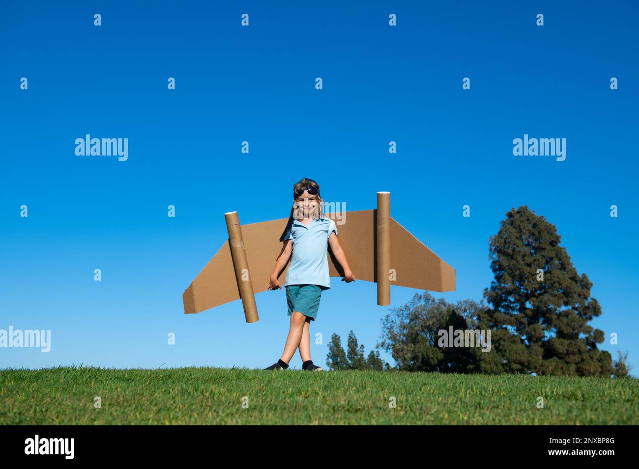 Boy child with wings at sky imagines a pilot and dreams of flying Stock ...