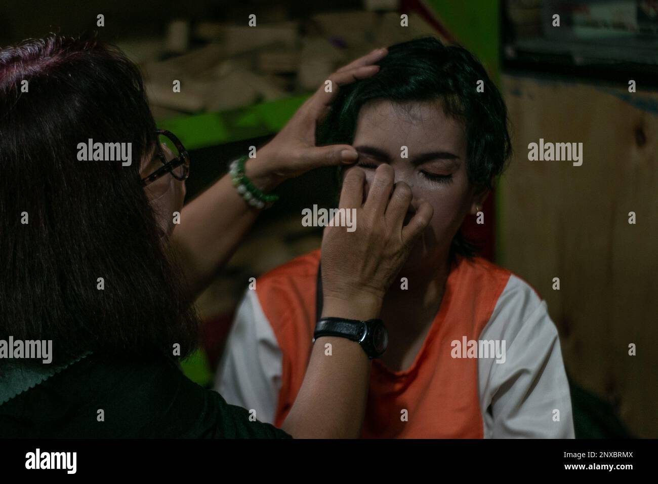 Bogor, Indonesia. 28th Feb, 2023. A blind bride prepares before on a ...