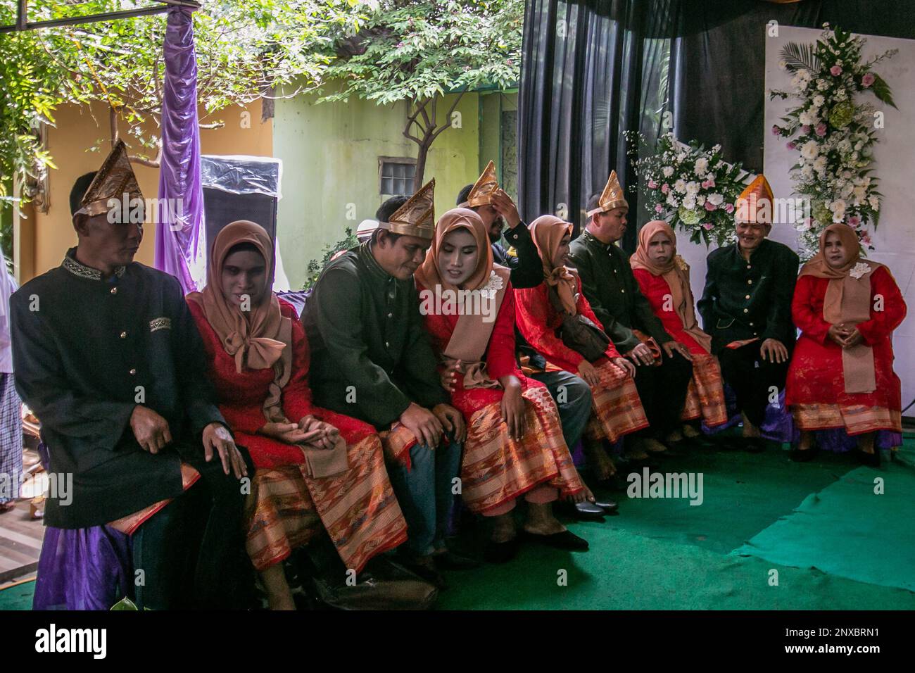 Bogor, Indonesia. 28th Feb, 2023. Blind bride and groom take part on a ...