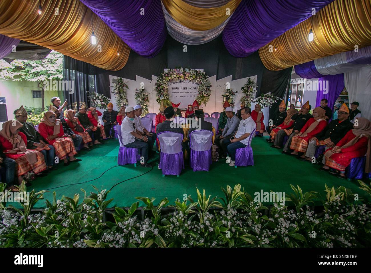 Bogor, Indonesia. 28th Feb, 2023. Blind bride and groom take part on a ...