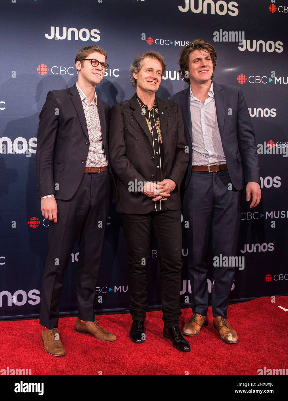 Jim Cuddy, center, is seen with son Devin, right, and Sam Polley during ...