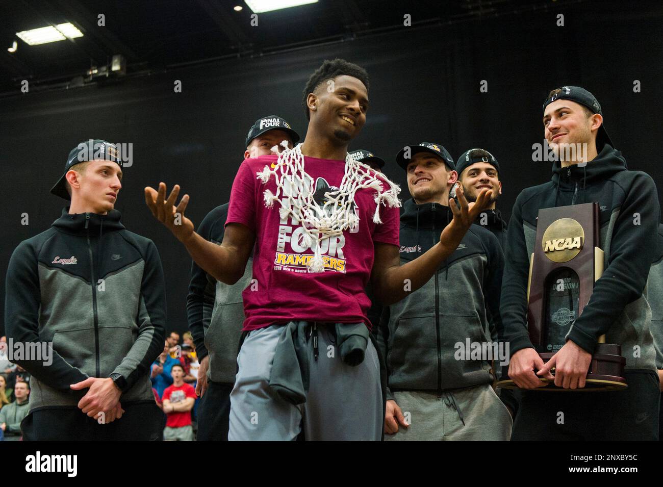 Donte Ingram, center, and his Loyola teammates during a rally inside ...