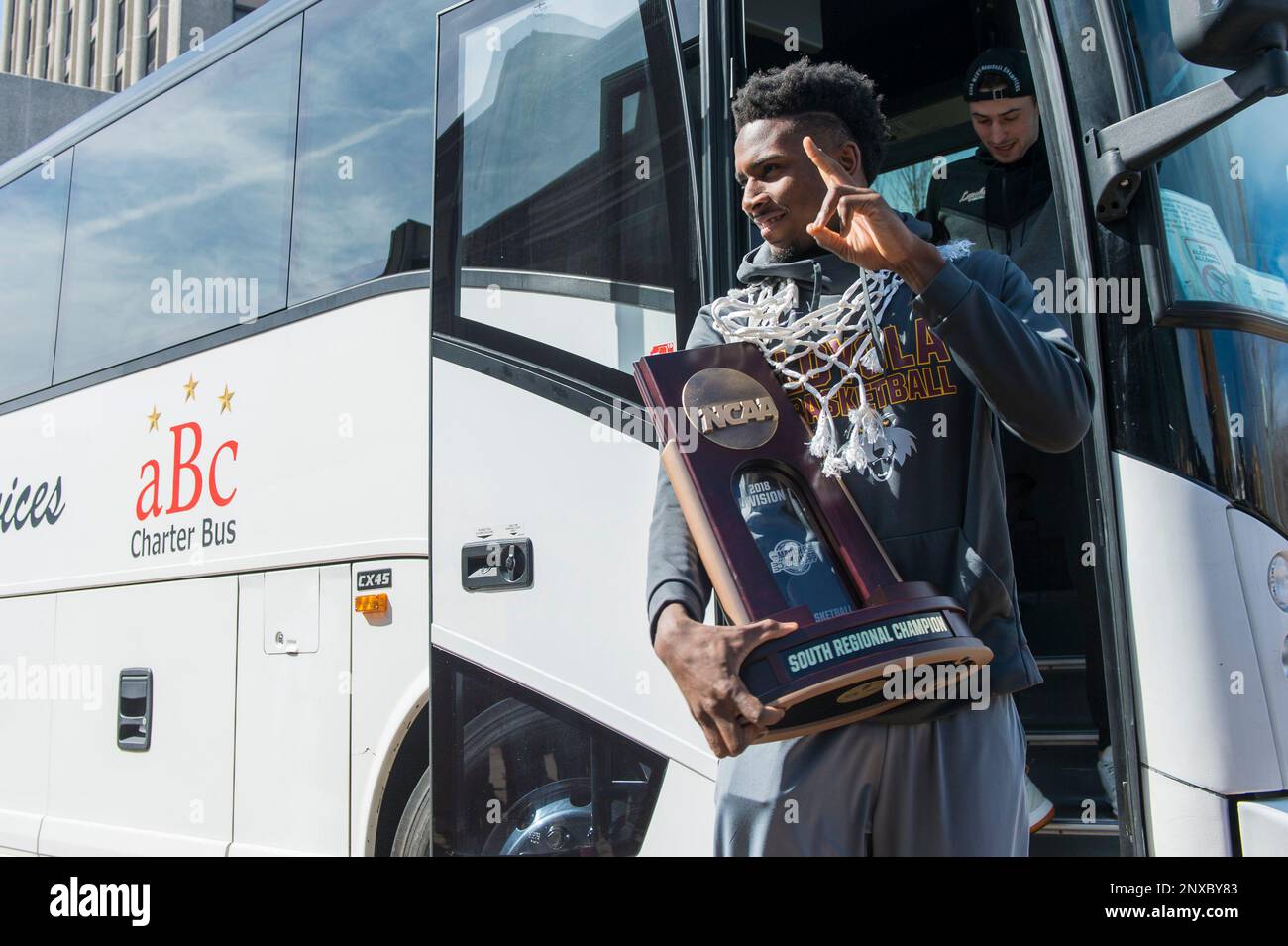 Donte Ingram and his Loyola teammates step off the bus with the NCAA ...