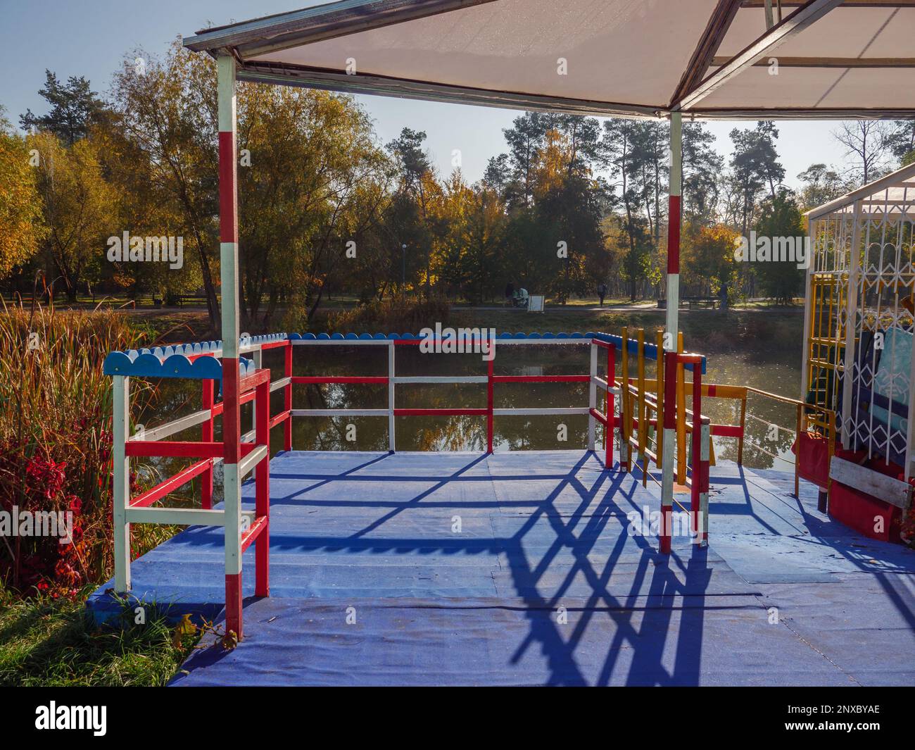 Old boating station with pontoon floating wharf close after the summer ...