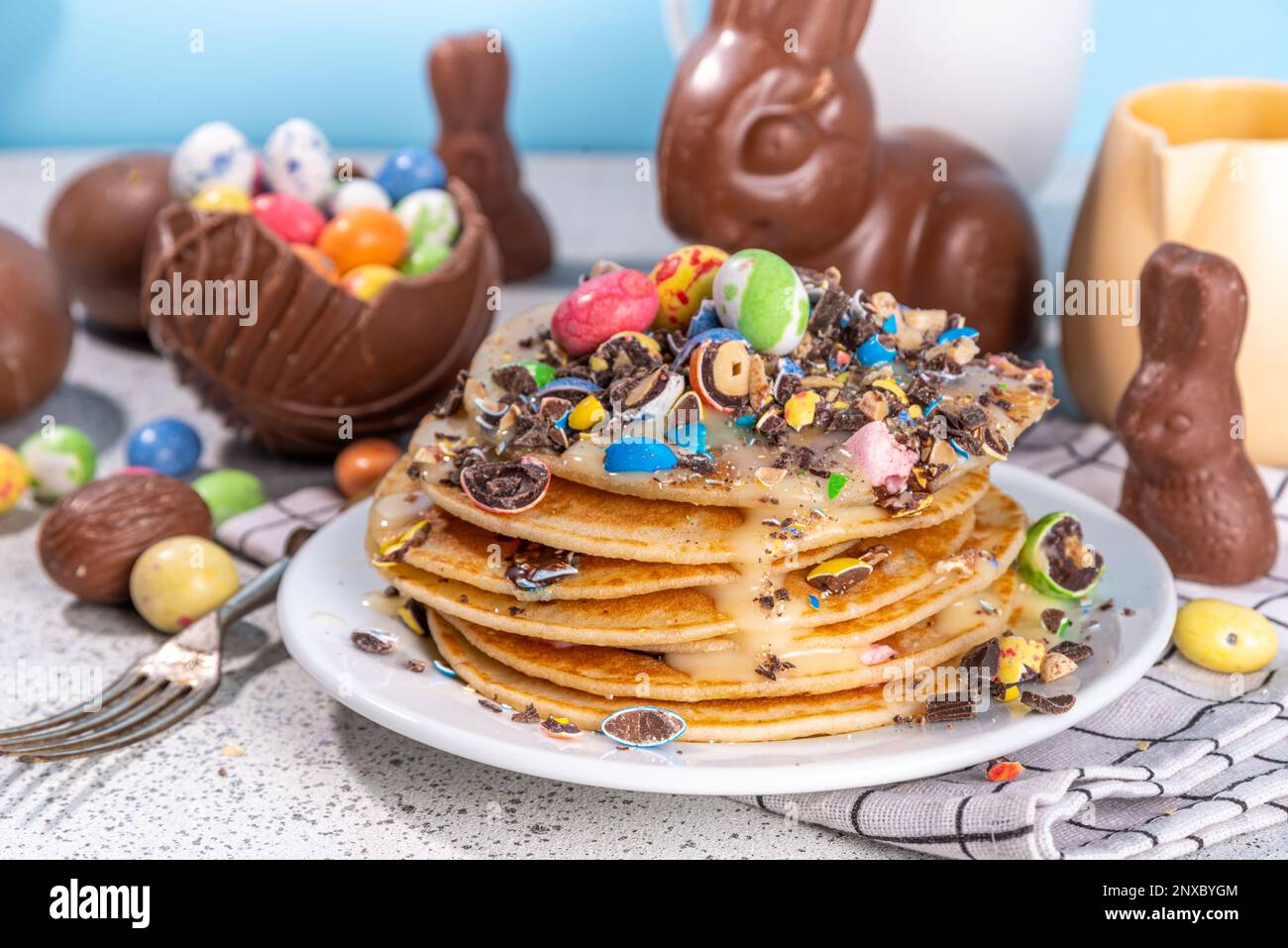 Children's funny cute breakfast for Easter. American pancakes, fried ...