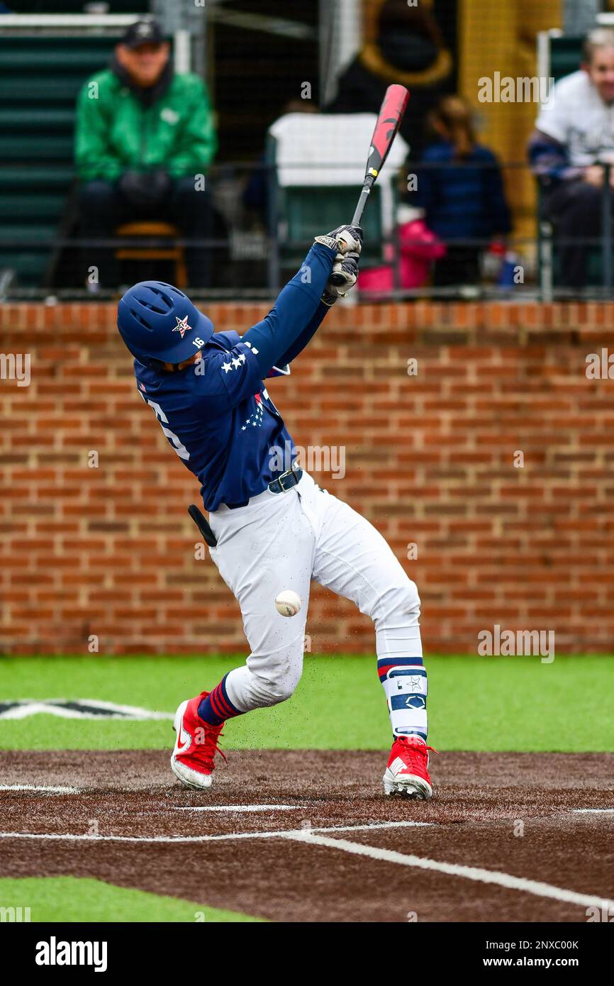 March 25, 2018: #16 Austin Martin hits the ball during the game between ...
