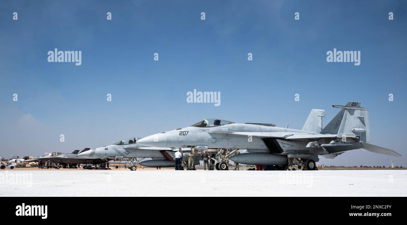 U.S. Navy F/A-18E/F Super Hornets, assigned to Carrier Air Wing (CVW) 5 ...