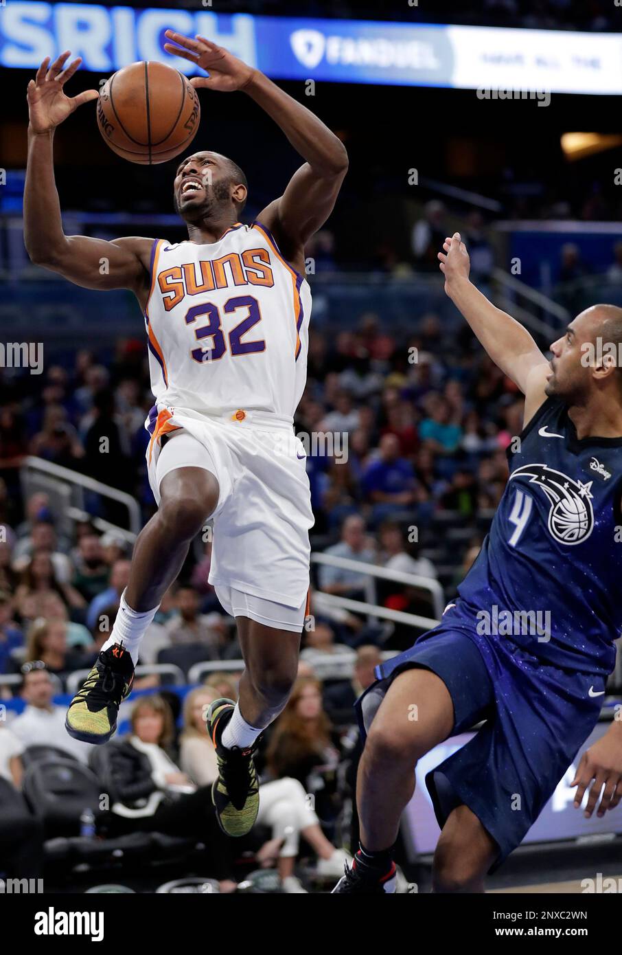 Phoenix Suns' Davon Reed (32) loses the ball after he is fouled by ...