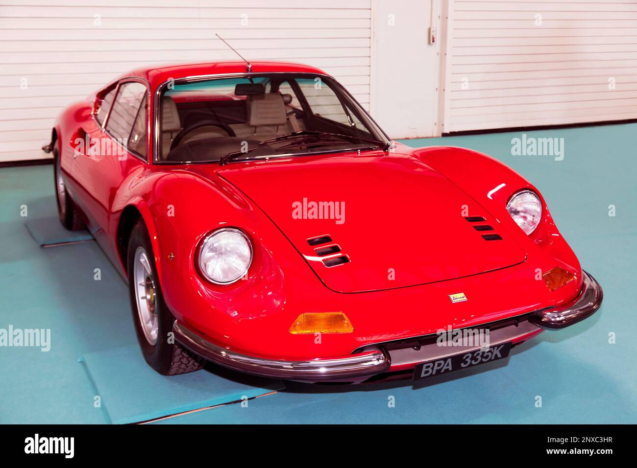 Three-quarters front view of a Red,1971, Ferrari Dino 246 GT, on ...