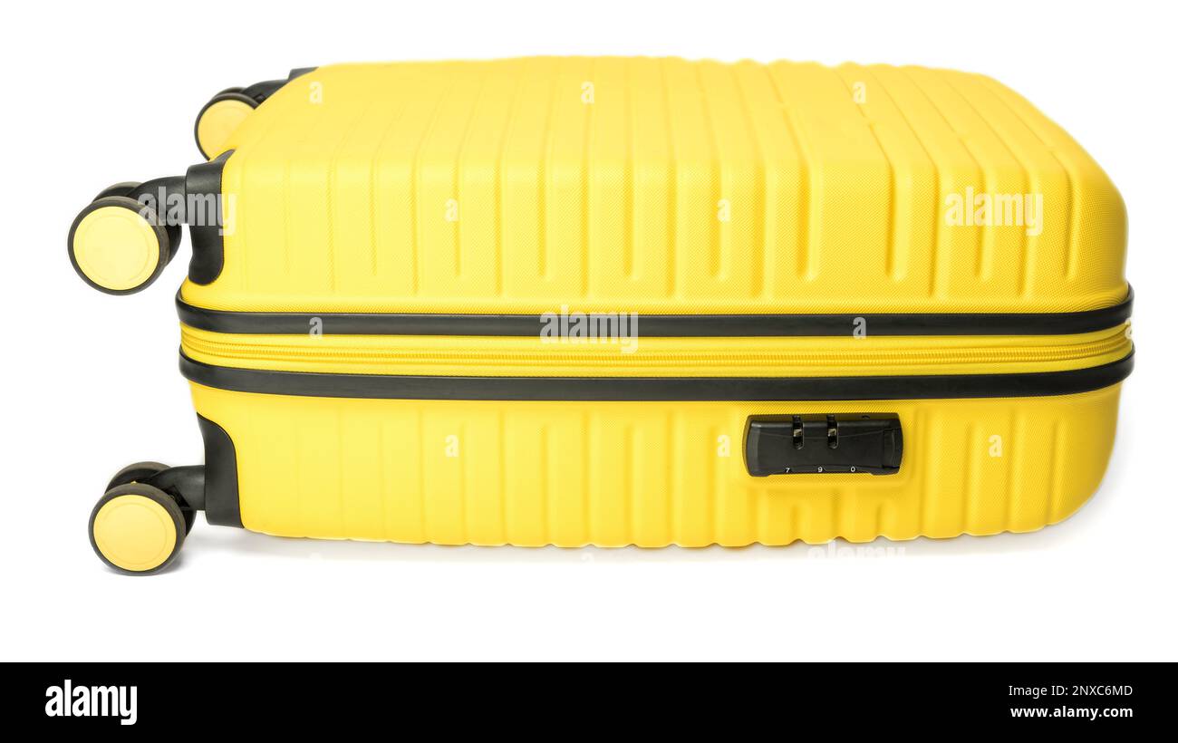 Yellow plastic suitcase isolated on white background Stock Photo - Alamy