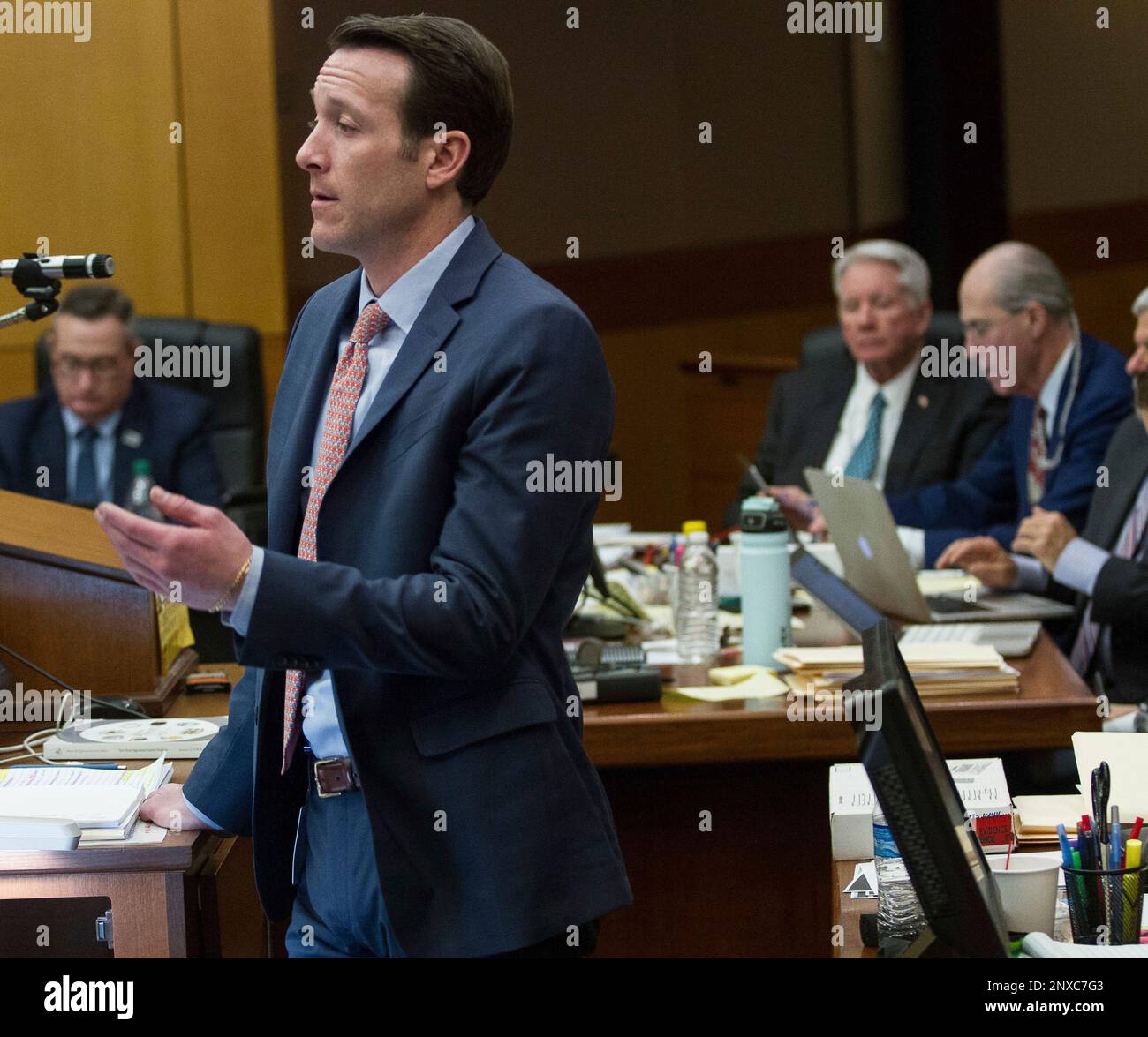 Assistant District Attorney Adam Abbate askes witness Robert Ahlers ...