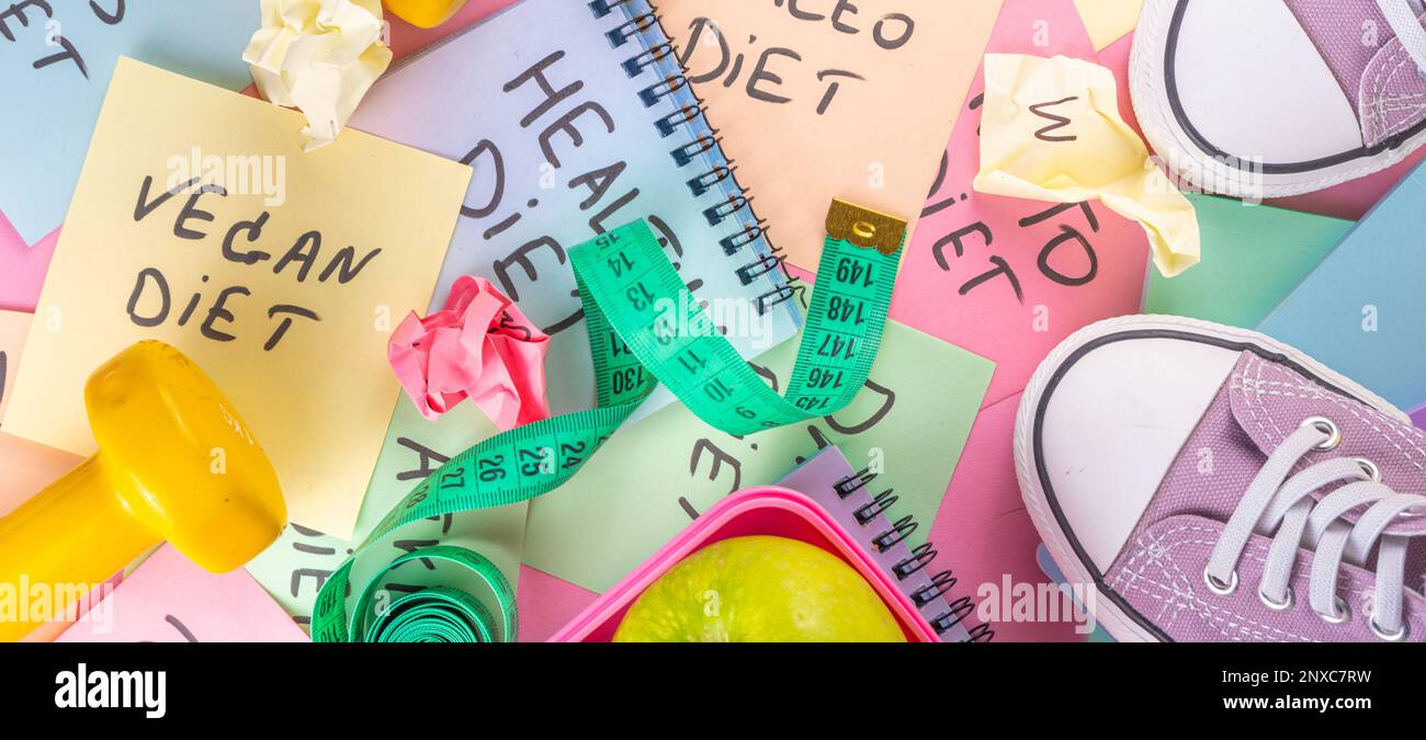 Slimming, fitness flat lay. Diet choice concept with bright handwritten ...