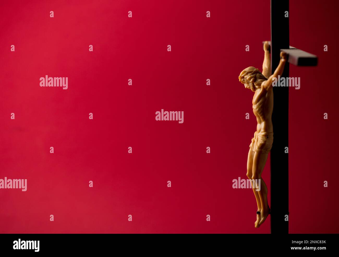 christian crucifix and red background Stock Photo - Alamy