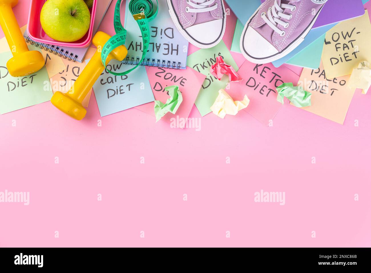 Slimming, fitness flat lay. Diet choice concept with bright handwritten ...