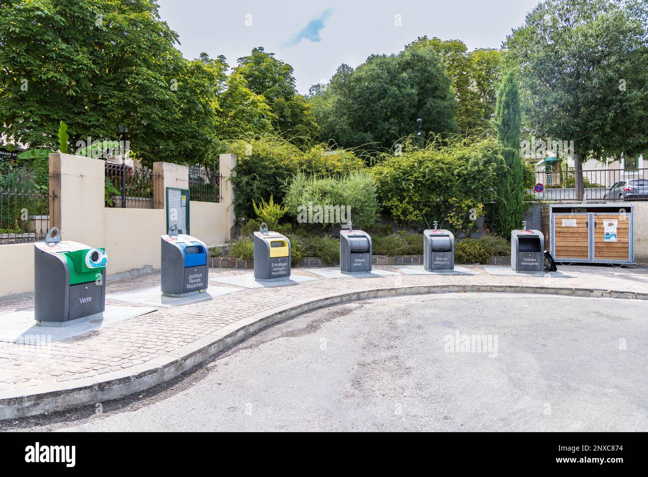 Waste sorting containers in a city in France Stock Photo - Alamy