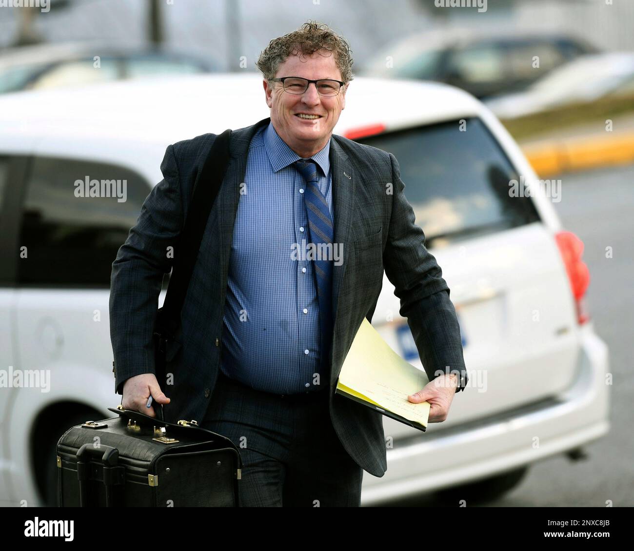 Attorney Andrew Shubin walks into the courthouse for the second ...