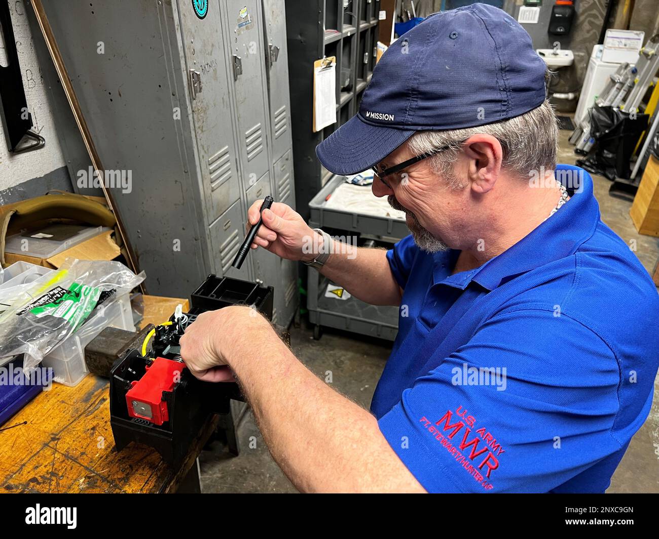 Marne Lanes Bowling Center lead mechanic, George Kessner, repairs a ...